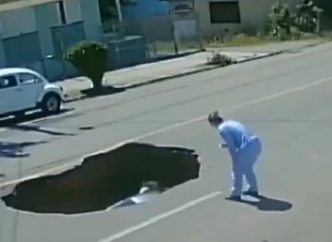 That is not a Shadow, that's a Hole in the Road..Watch This