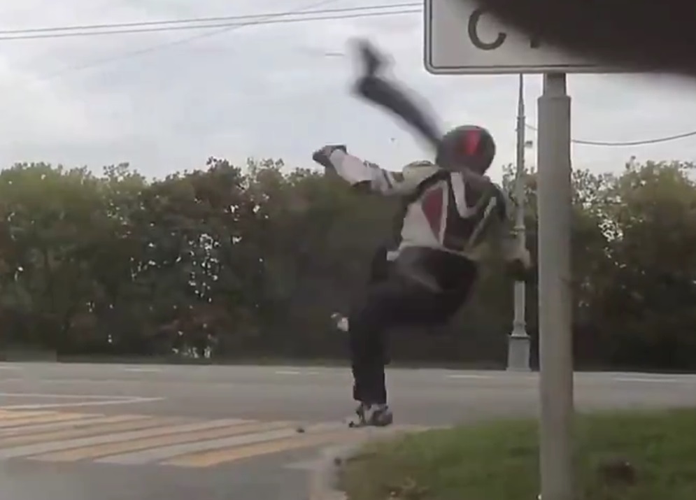 Sliding Out of Control Man Hits Curb with Deadly Force....Wait for it