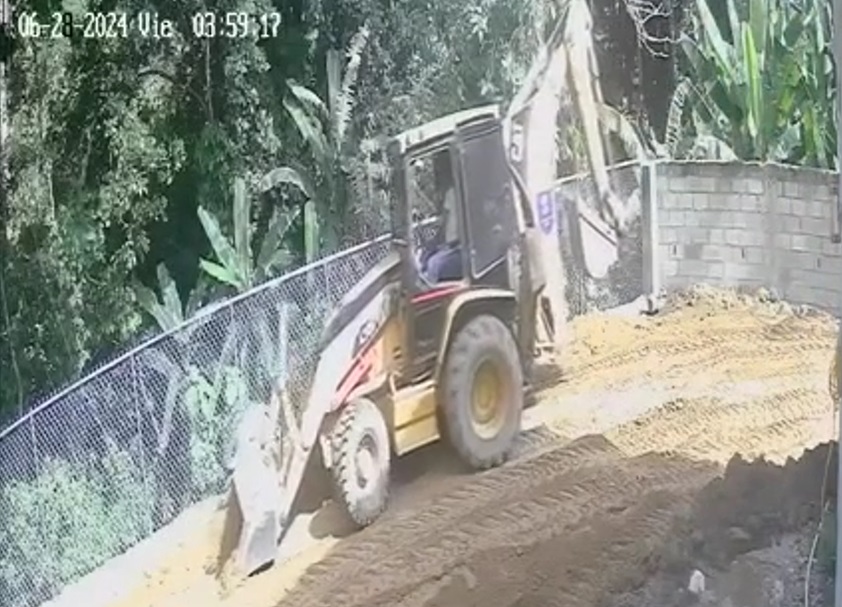 Man Operating Backhoe Falls to his Death along with the Machine